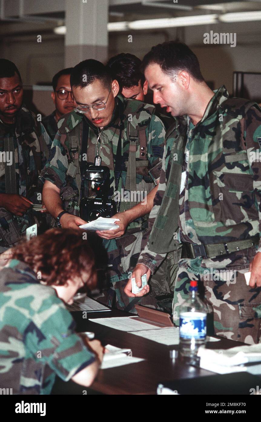 Combat Camera crew members, SSGT Lance Cheung (L) and TSGT Ray Conway ...