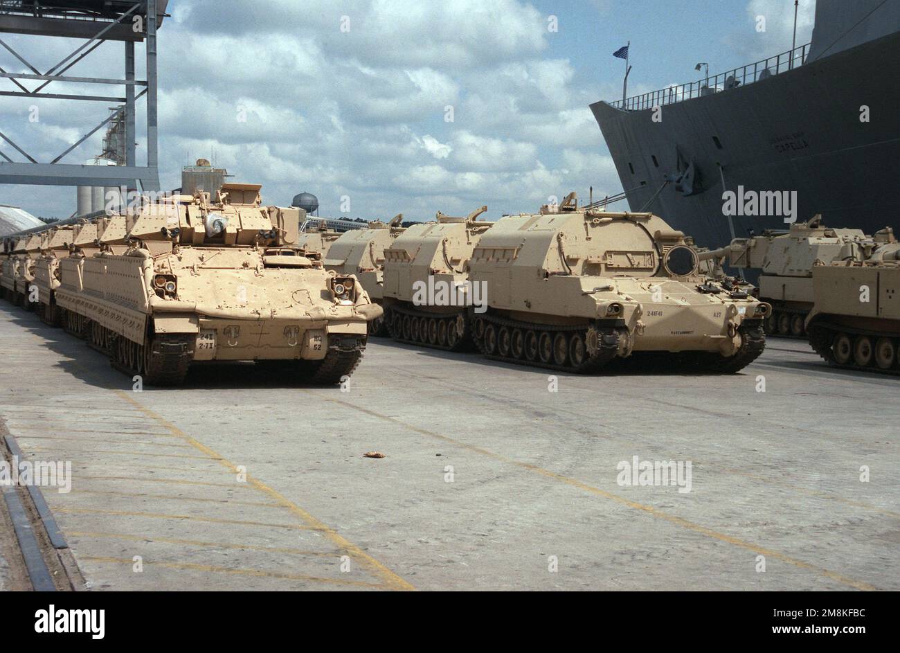 Bradley tow fighting vehicles and field artillery ammunition support ...