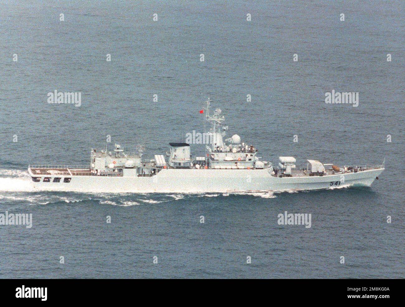 An aerial starboard wide view of the Chinese Navy Jiangwei class guided missile frigate Huaibei ...