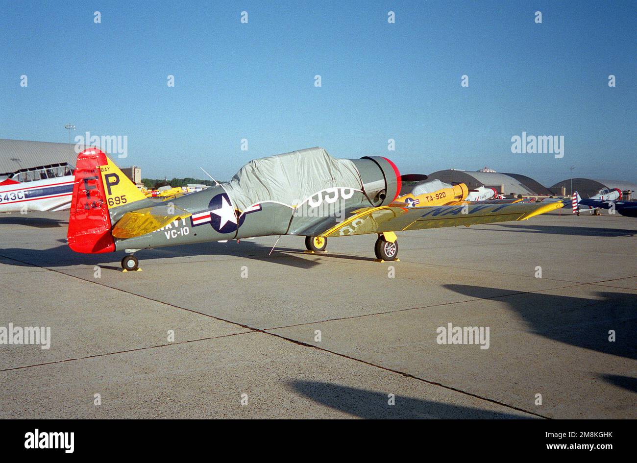 A right rear view of an SNJ Texan aircraft, in NAS Guantanamo Bay paint ...