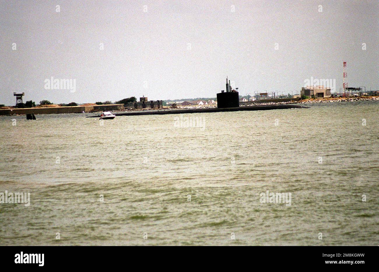 A port side view of the nuclear-powered attack submarine USS BOISE (SSN ...