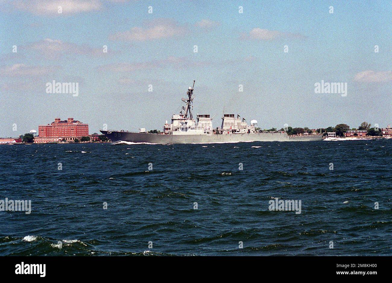 A port side view of the guided missile destroyer USS STOUT (DDG-55 ...