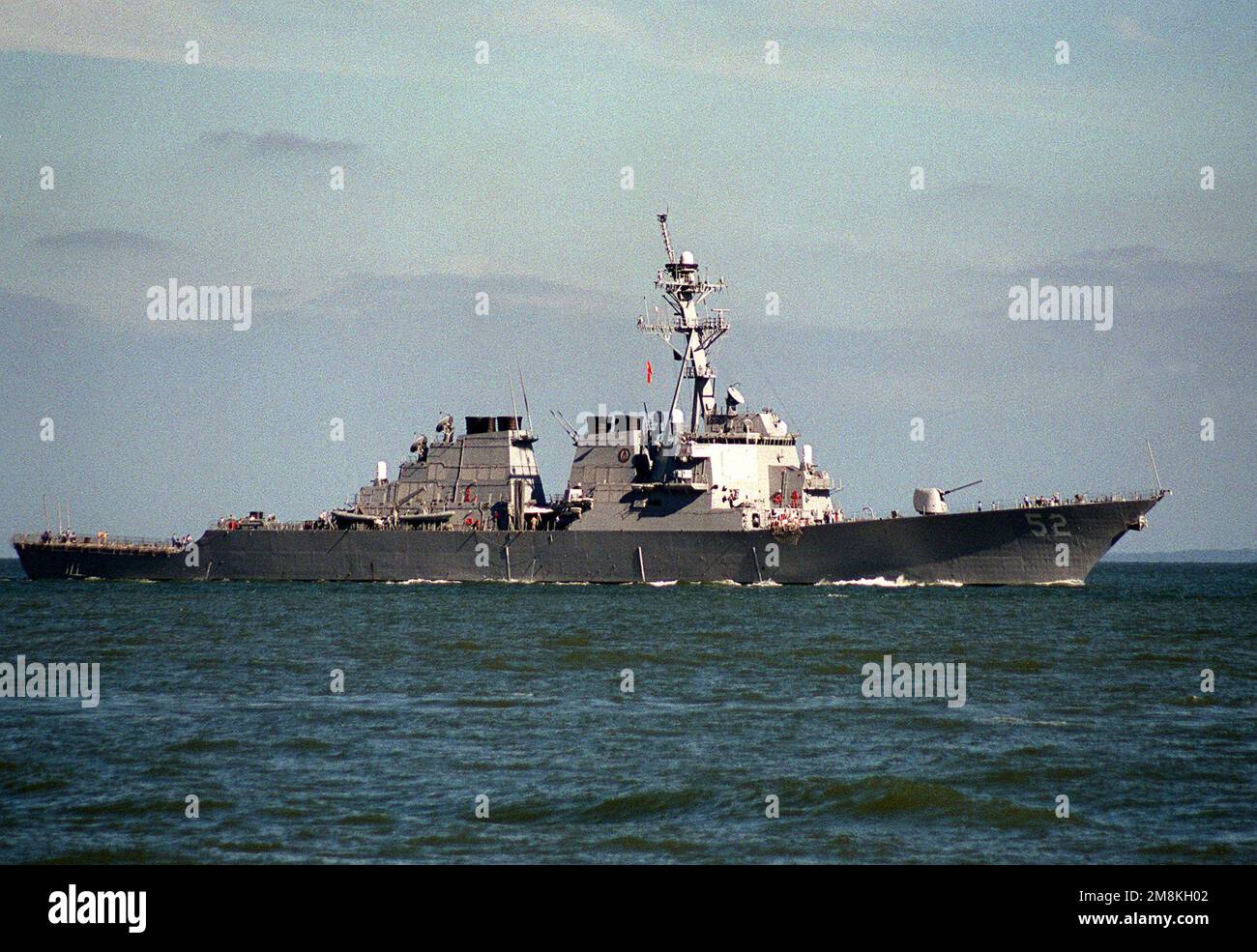 A starboard side view of the guided missile destroyer USS BARRY (DDG-52 ...