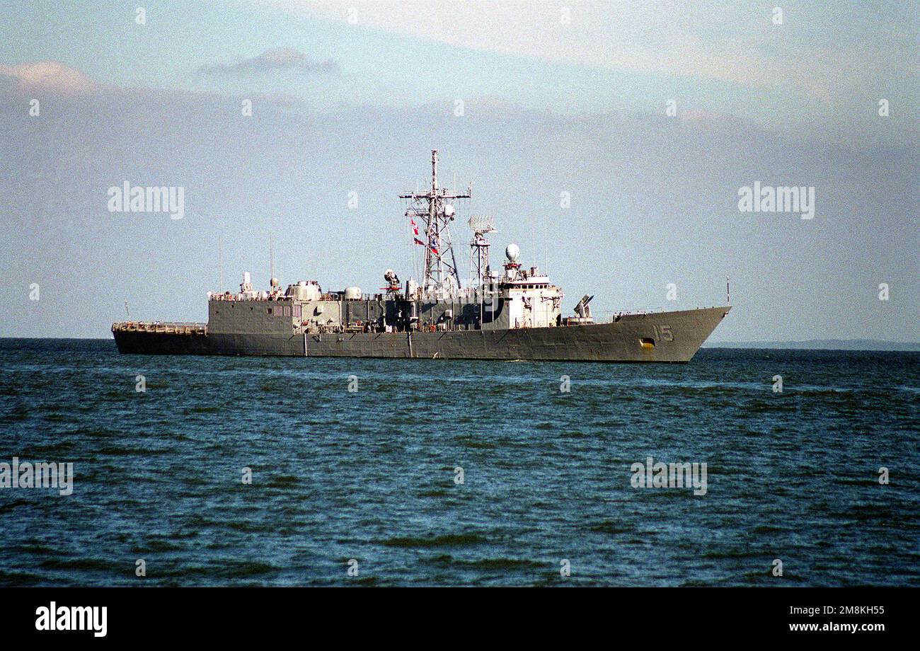 A port bow view of the Naval Reserve Force guided missile frigate USS ...