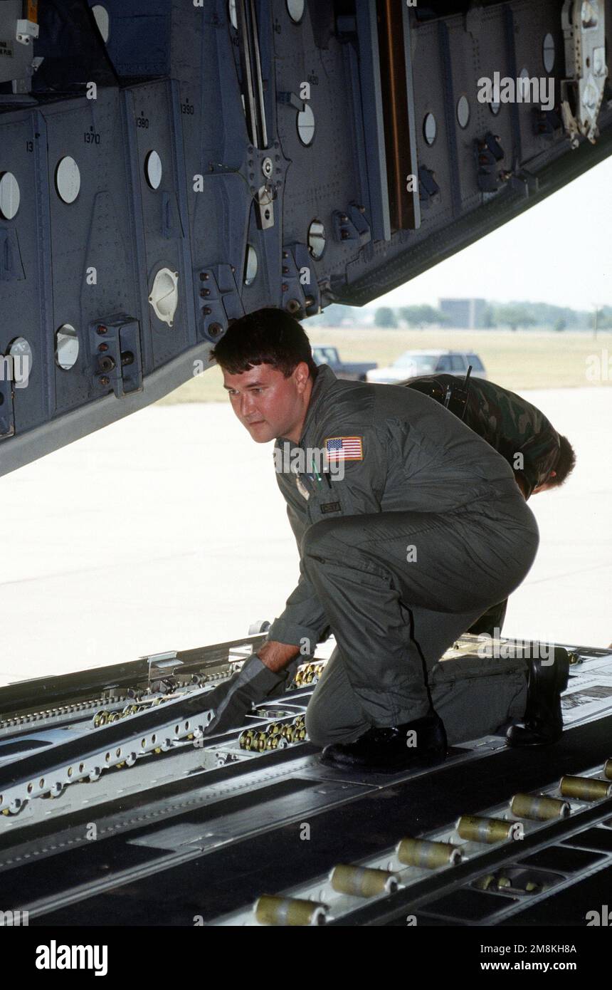 STAFF SGT. Day prepares loading ramps on his C-17 Globemaster ...