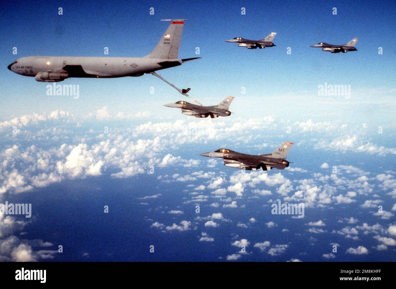 A wide angle view of a US Air Force KC-135 Stratotanker as it refuels a ...