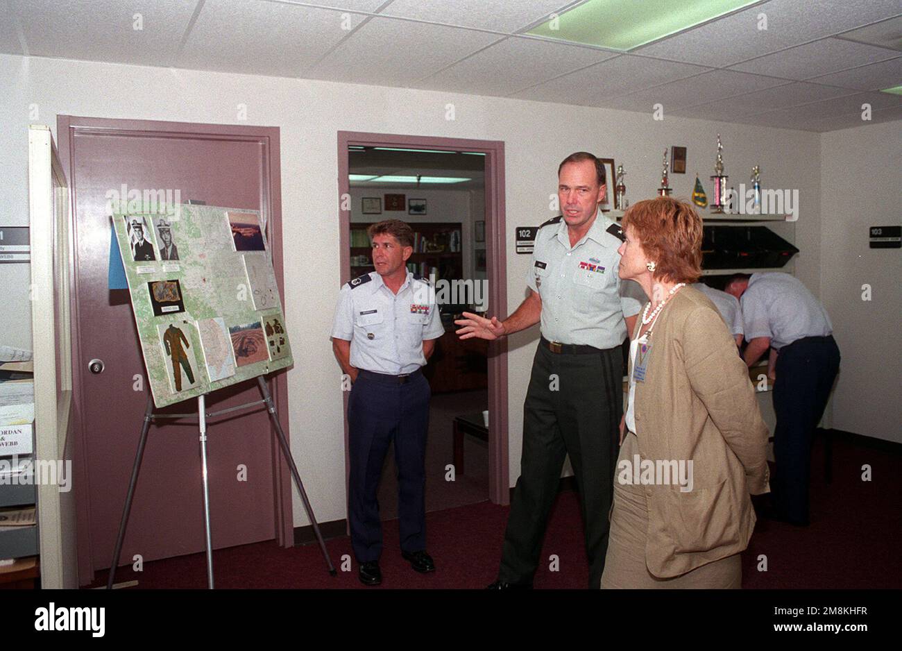 Secretary of the Air Force Sheila Widnall is briefed on operations at ...