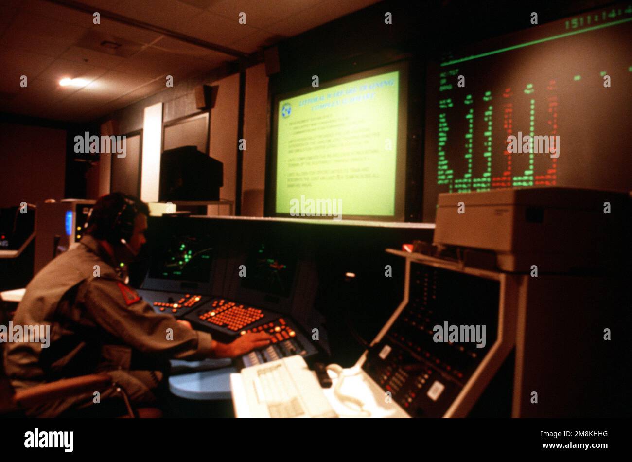 CMDR. Doug Allen, Opposition Air Force Coordinator, monitors progress ...