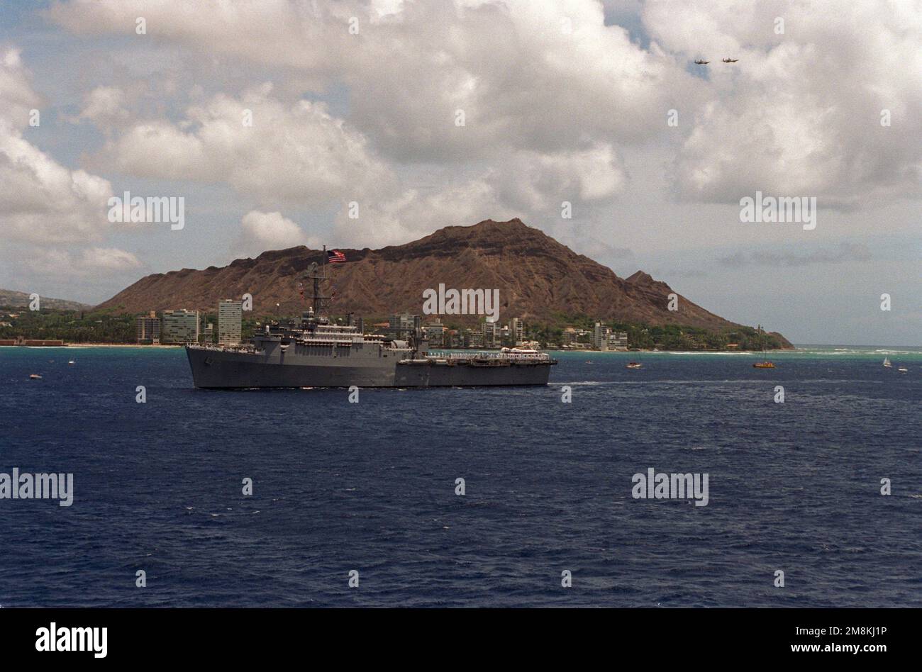 The dock landing platform ship USS CLEVELAND (LPD-7) passes Diamond ...