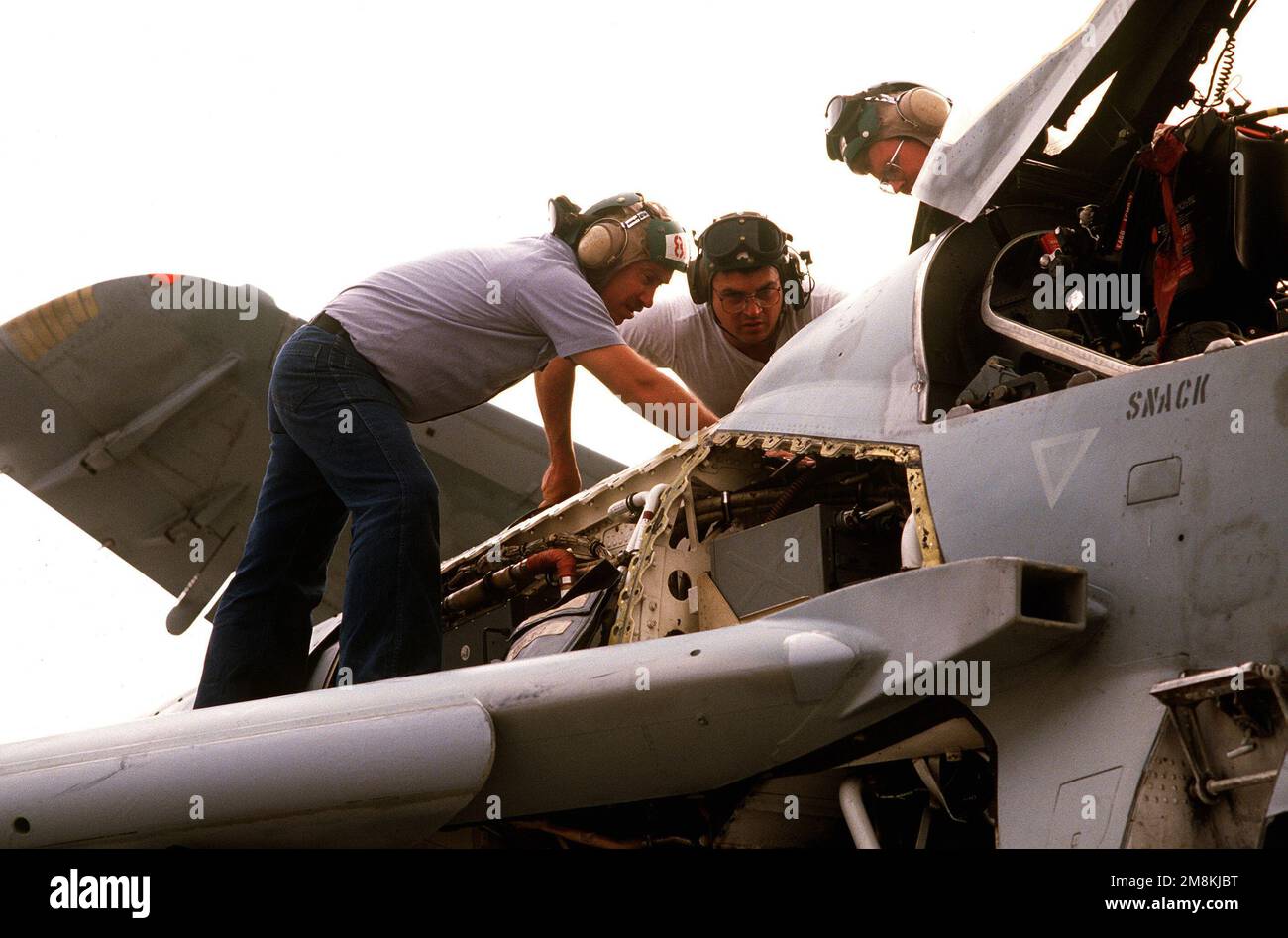 US Navy aircraft maintenance personnel perform a 56 day preventive ...