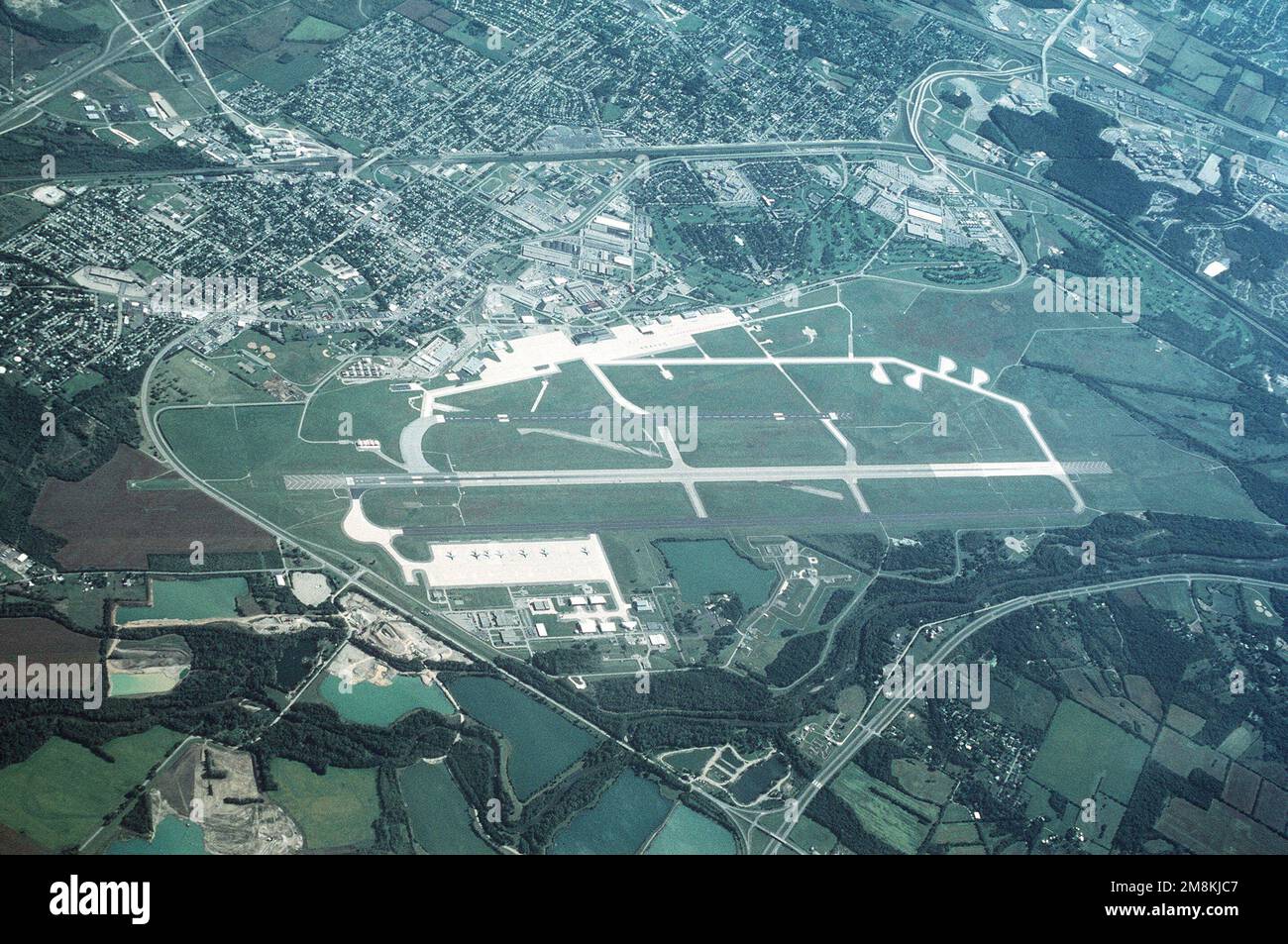 High oblique aerial view looking east. This base is headquarters for the Air Force Material ...