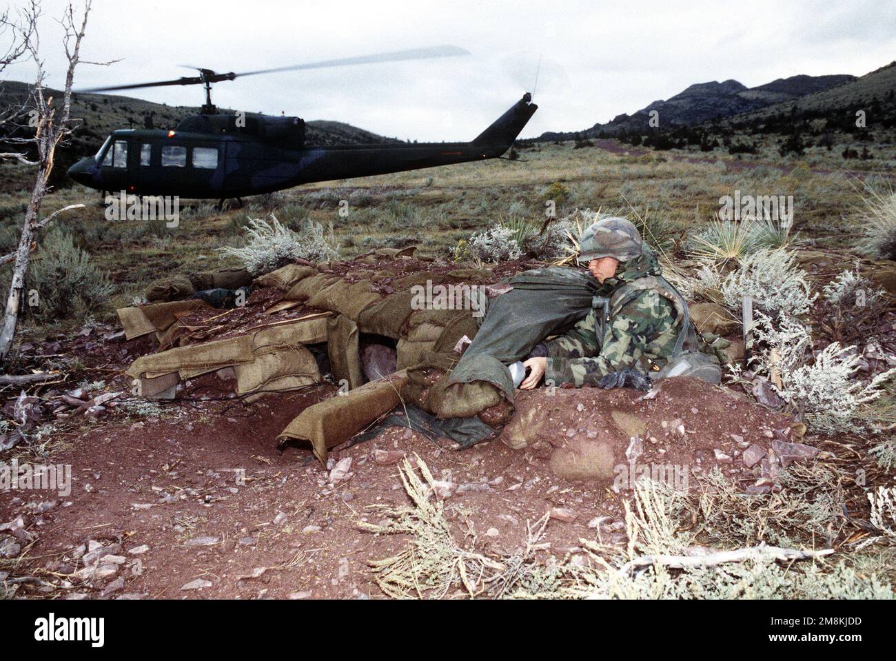 SENIOR AIRMAN Robbie Robinson, 341st Security Police Squadron, looks up ...