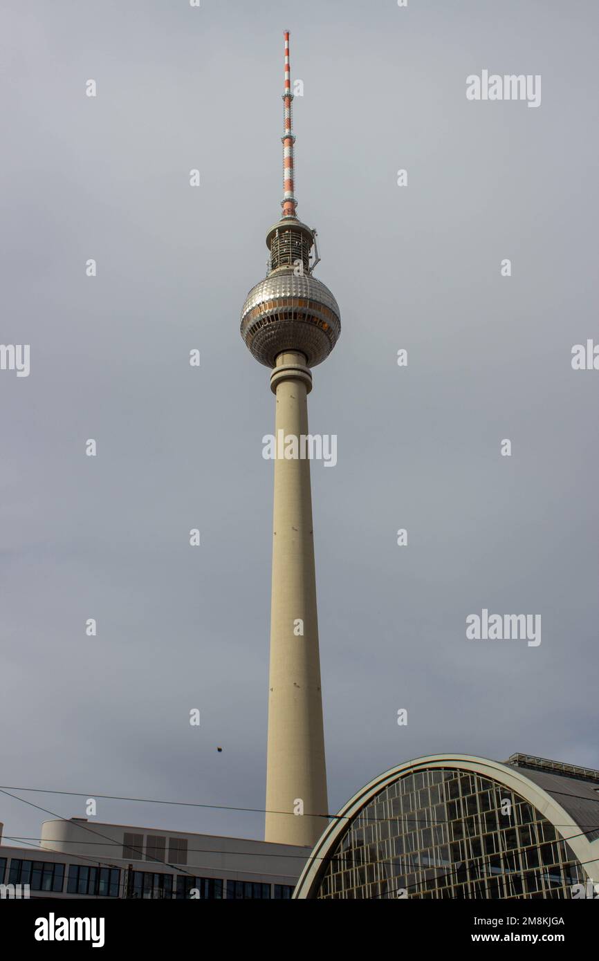 A vertical shot of the famous TV tower at Alexanderplatz in Berlin, Germany Stock Photo - Alamy