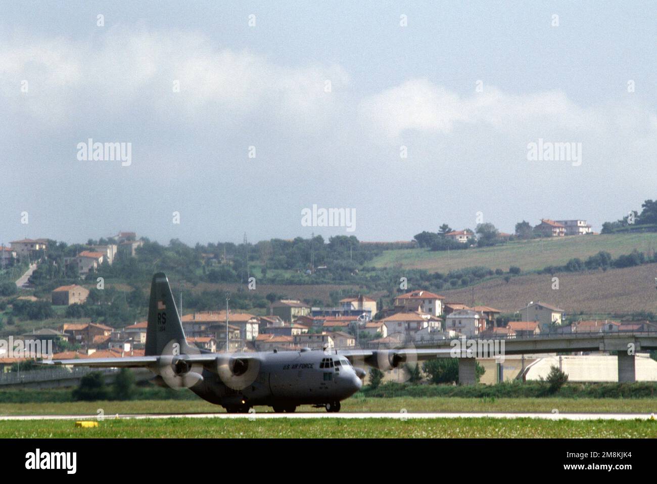 A U.S. Air Force C-130 Hercules rolls for takeoff from Ancona Airport ...