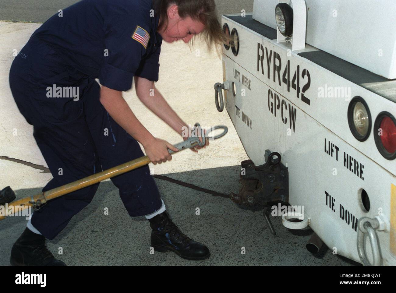 AIRMAN (AN) Diana Pitstick is unhooking a Mark 7 weapons cart from an ...