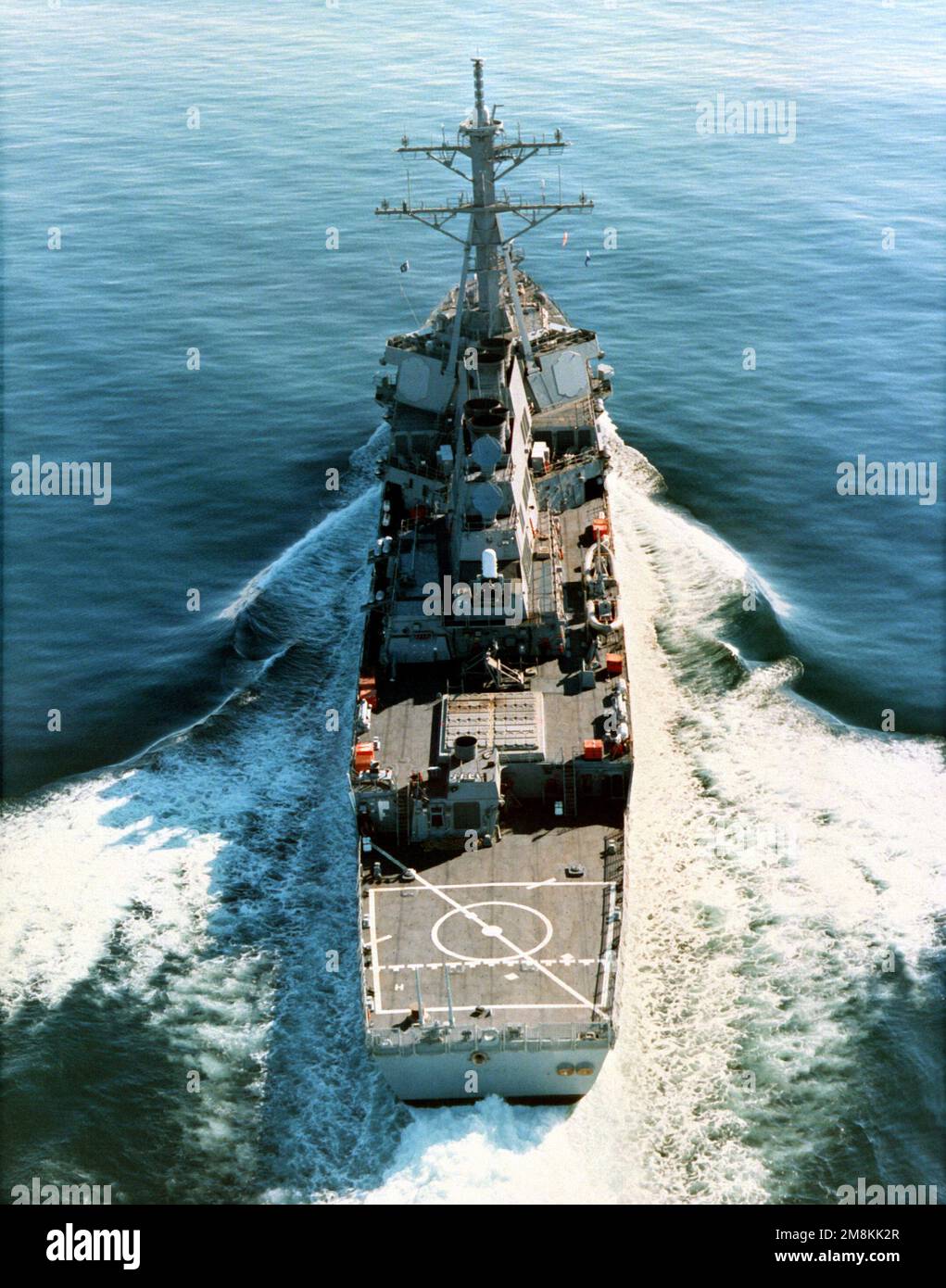 Aerial high oblique stern-on view of the guided missile destroyer USS ...