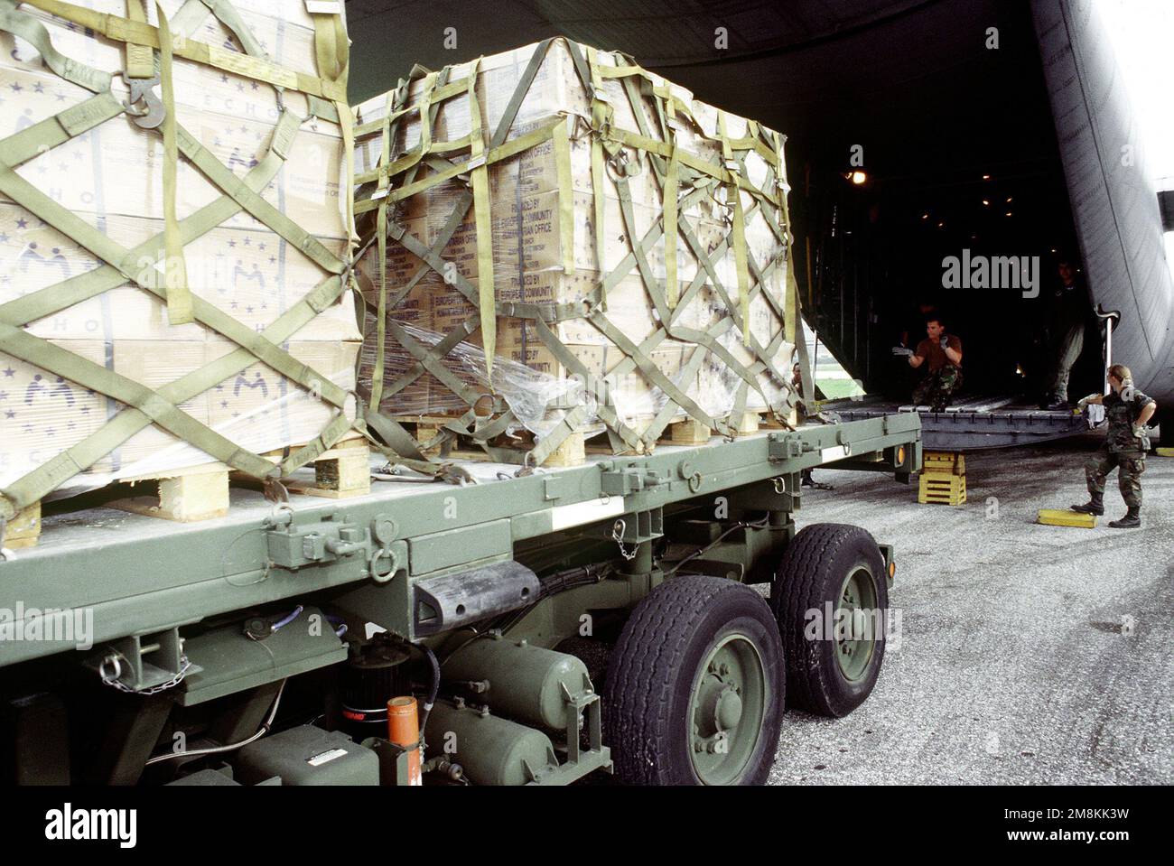 A K-loader moves pallets of soap for loading onto an U.S. Air Force C ...