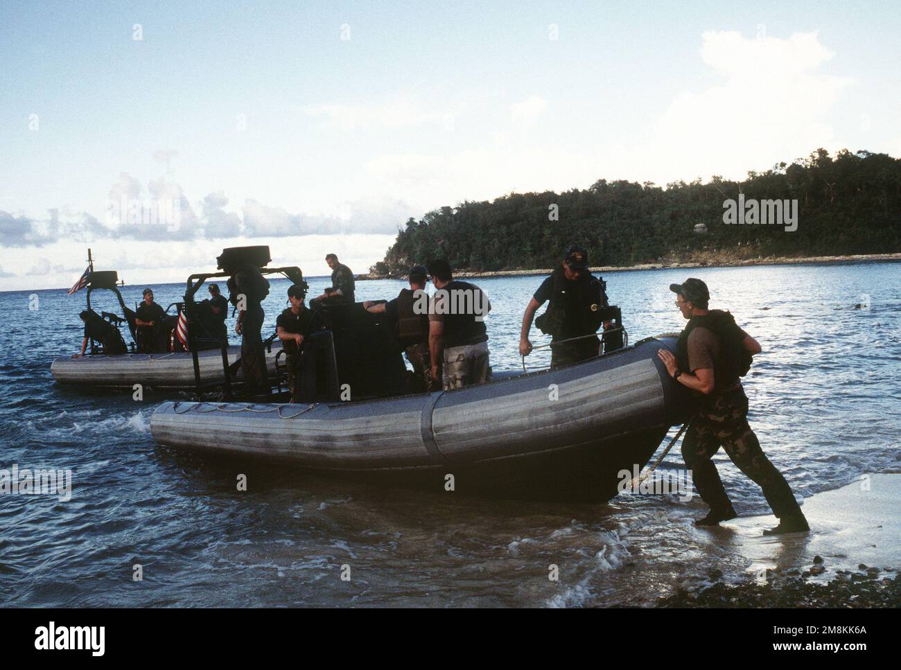 CHIEF Gunners Mate (GMGC) Rick Simonsen helps push off two 24-foot ...