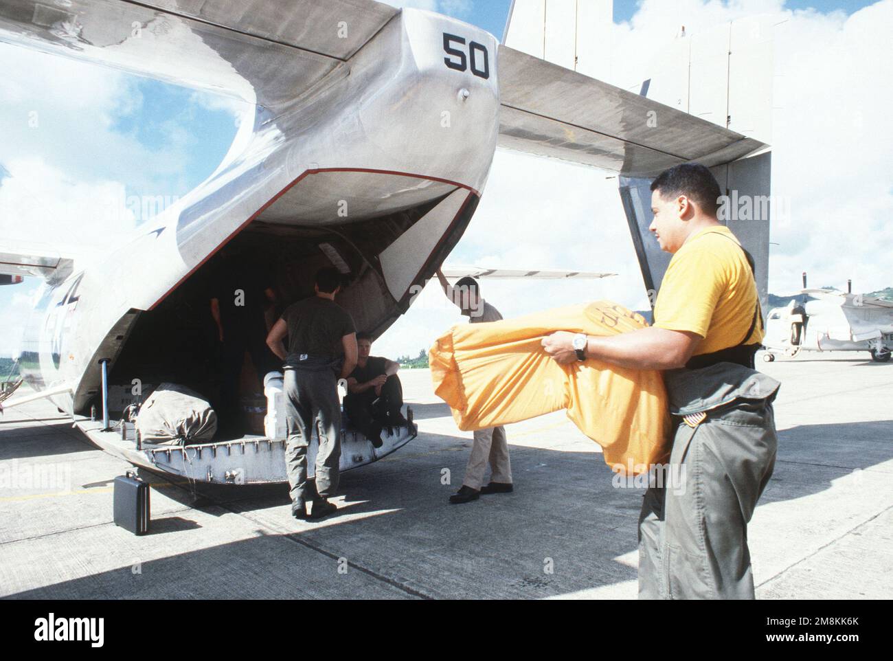 Members of SEAL Team 8 and Aviation Machinists Mate First Class (AD1 ...