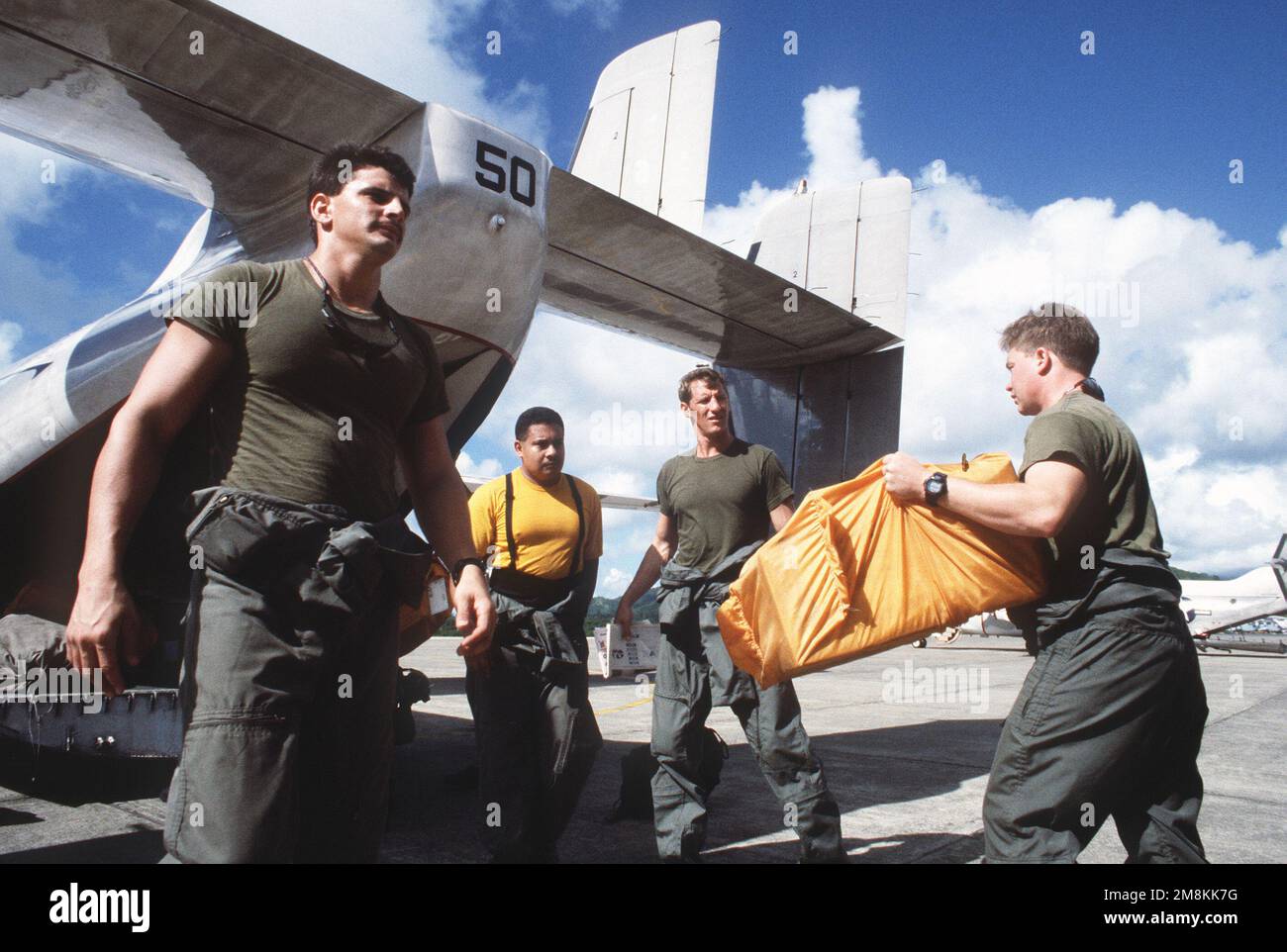 Members of SEAL Team 8 and Aviation Machinists Mate First Class (AD1 ...