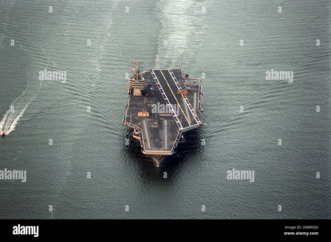 An aerial bow on view of the nuclear powered aircraft carrier USS JOHN ...
