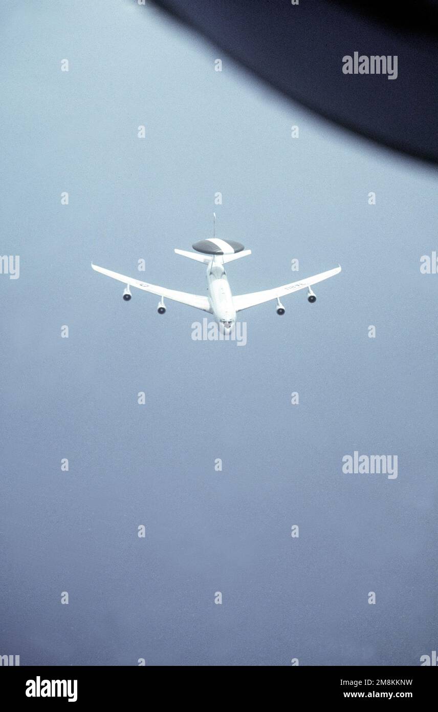 Front aerial view from a tanker of an E-3 preparing for refueling ...