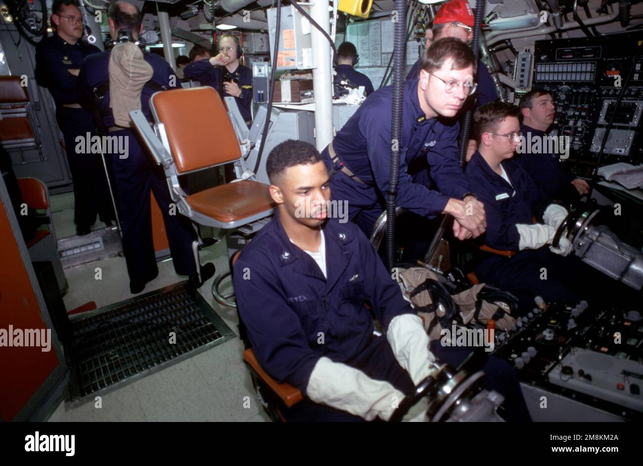 Sailors man their post in the Ship Control Station on board the nuclear ...