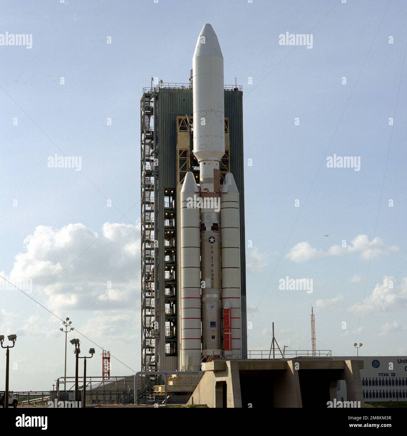 An Air Force TITAN IV Centaur launch vehicle sits poised on Complex-40 ...