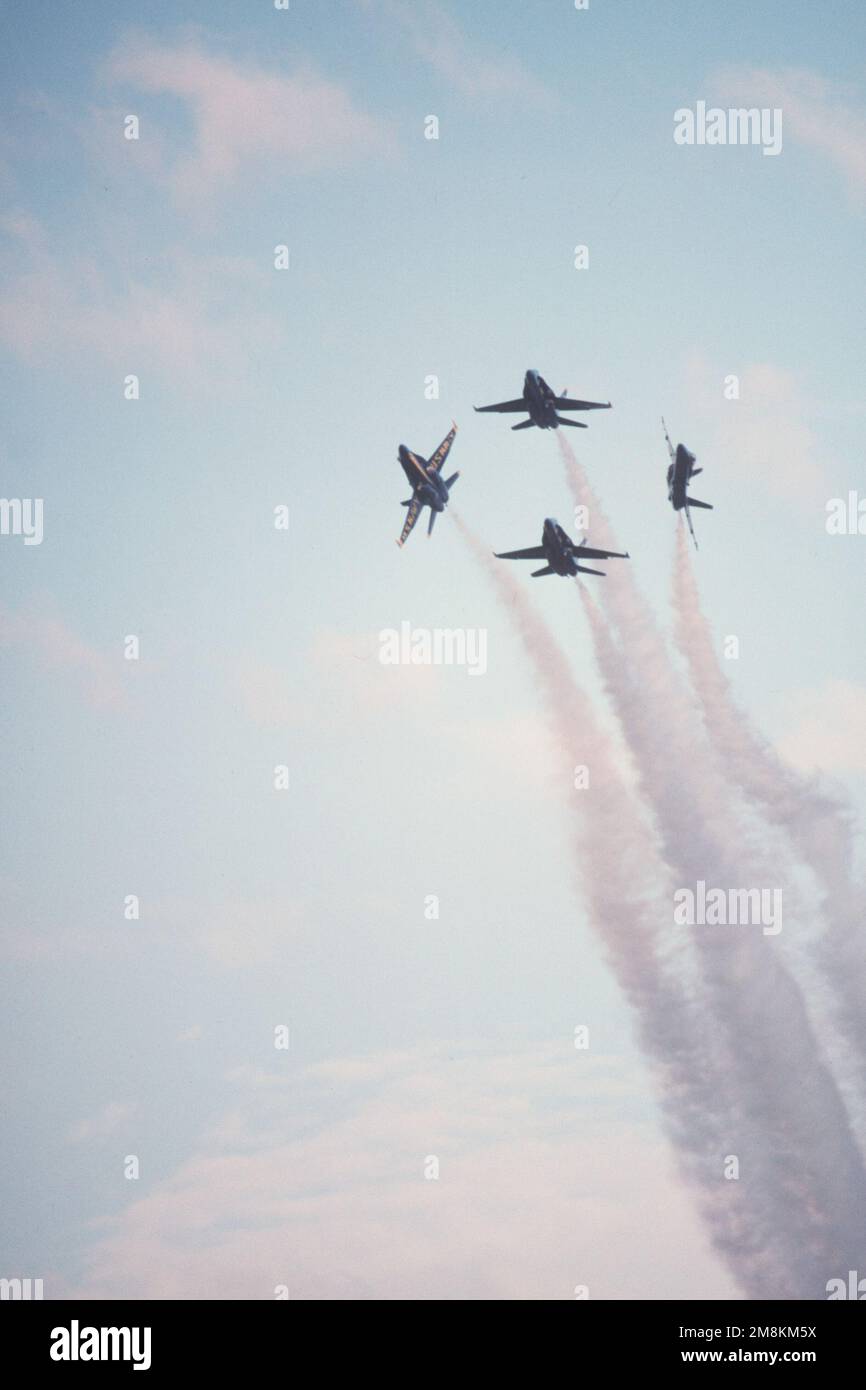 Four F/A-18 Hornet aircraft break out into a flur-de-lume formation ...