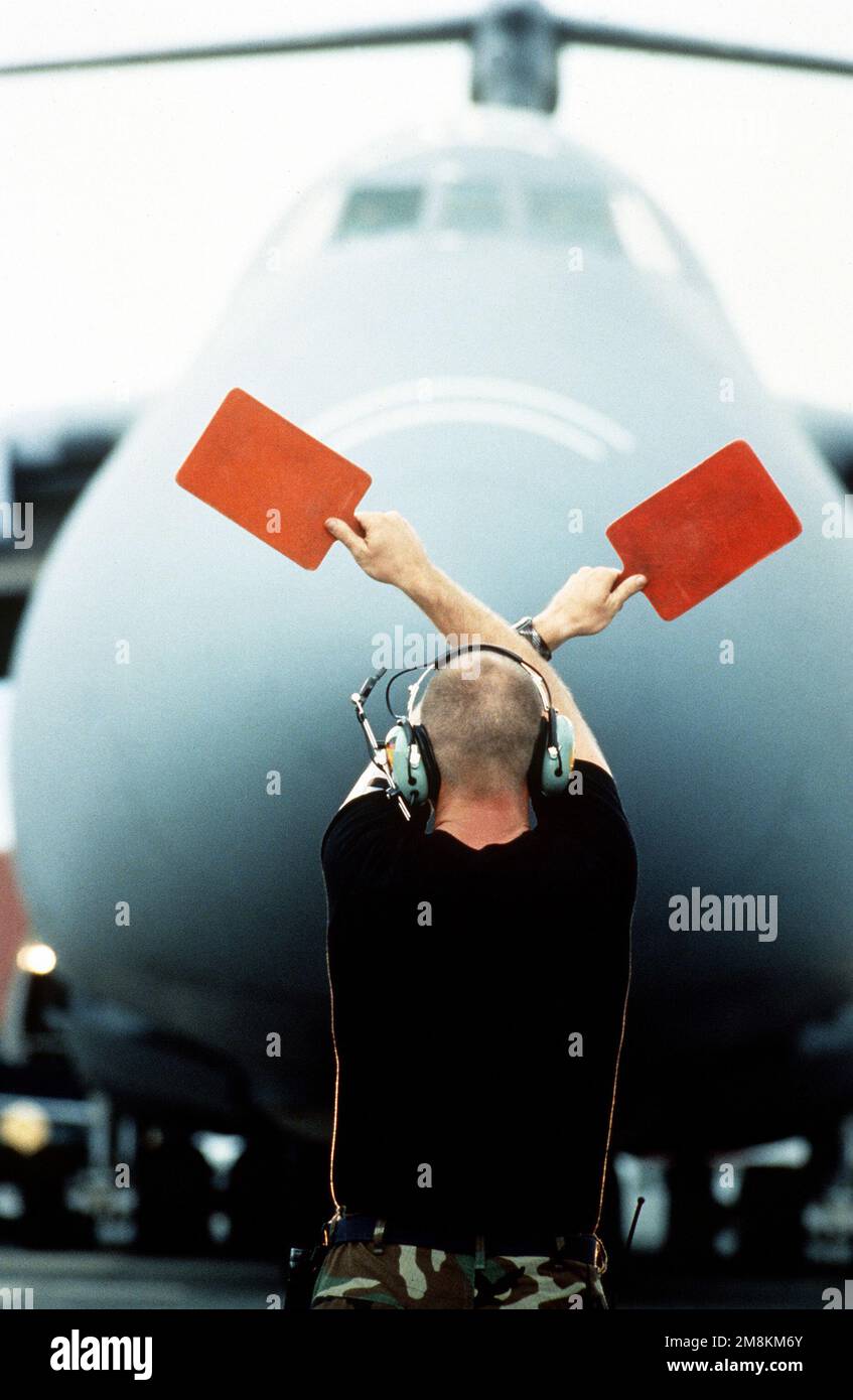 TECH. SGT. Michael Simpson, crewchief from the 640th AMSS, marshals in ...