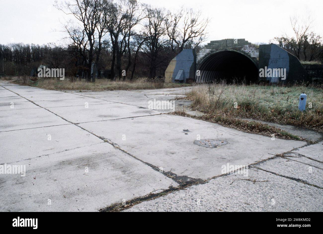 An asphalt road leads to a series of bunkers. Sarmelleck, a former ...