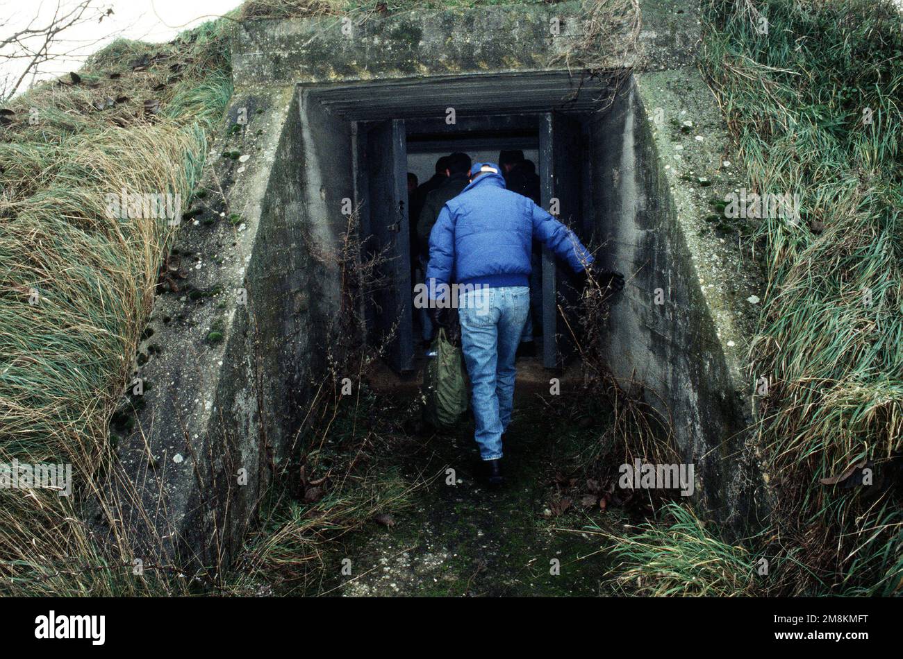 A survey team enters a bunker off an active taxiway. Many of these ...