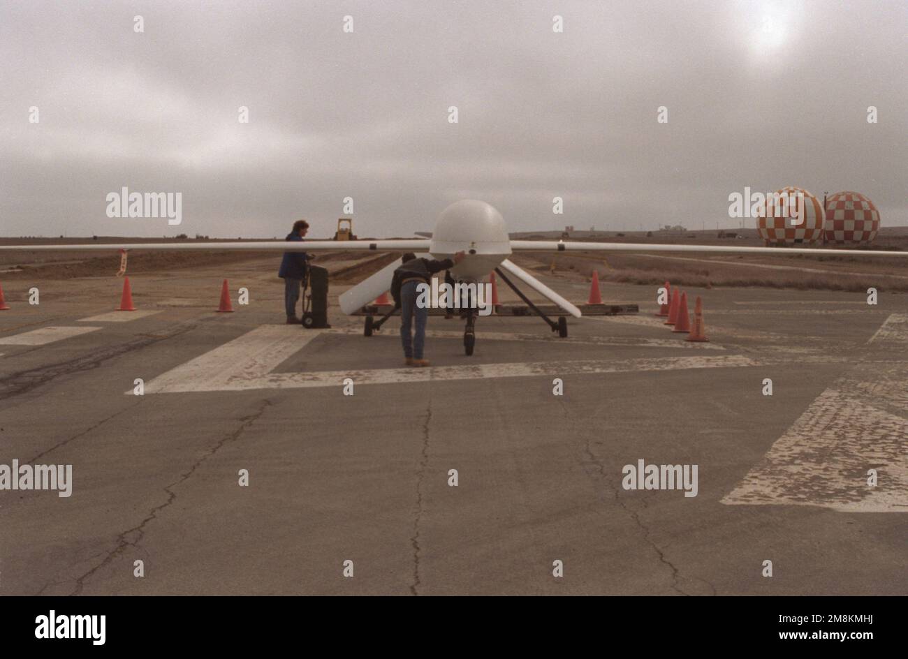 Civilians from General Atomics Aeronautical Systems. Inc., designers of ...
