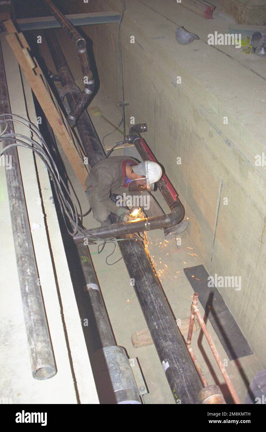 Renovation of the Pentagon building. Welder at work during the Pentagon ...