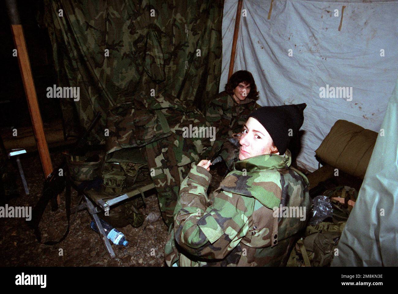 Builder Constructionman Recruit (BUCR) Cristina Laconiz (foreground ...
