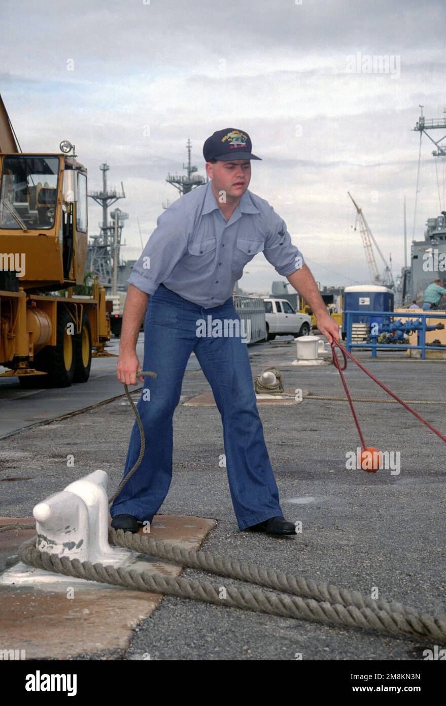 Electronic Warfare Technician Third Class (EW3) Lloyd Reeves catches a ...