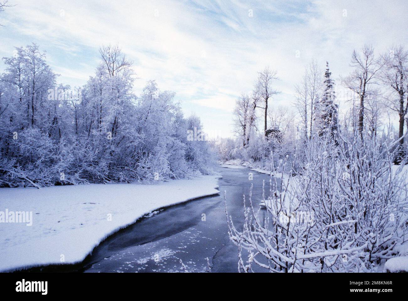 Winter view of Ship Creek from along the perimeter road leading to main base. Base: Elmendorf ...