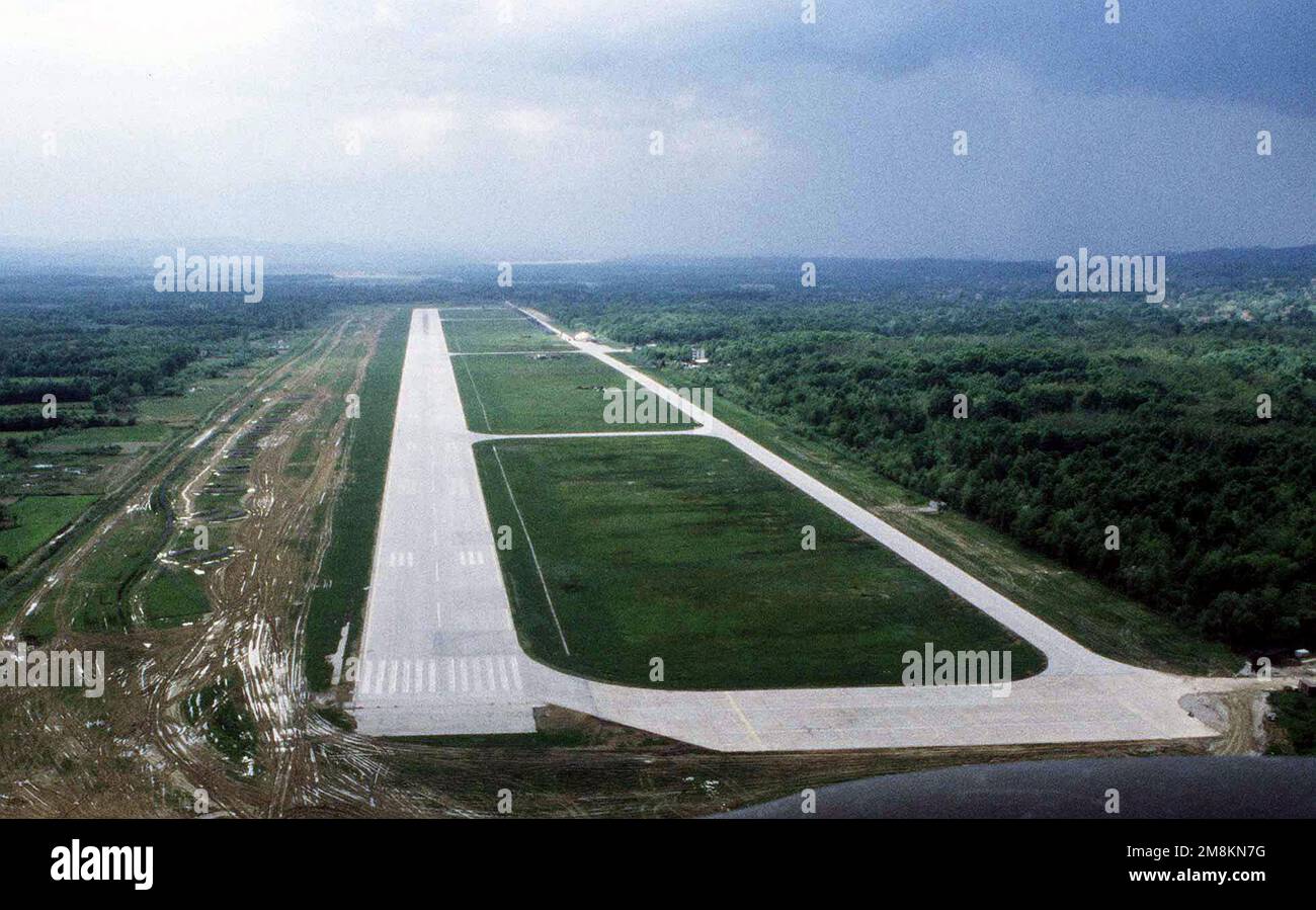 An aerial view of the runways at an unidentified airfield. Exact Date ...