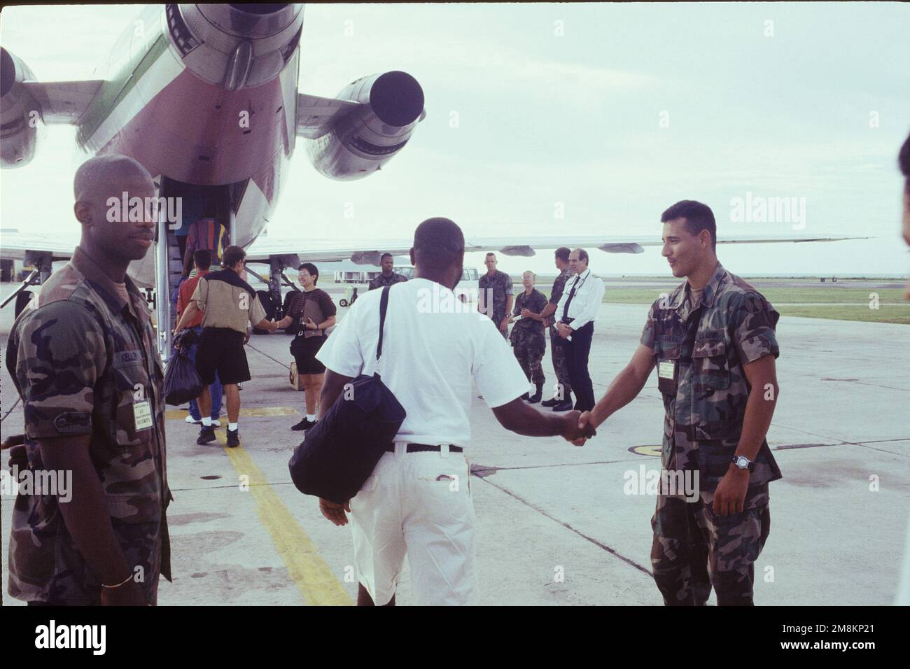 US Army PFC Ravera (right) and SPC Keller (left) shake hands with Cuban ...