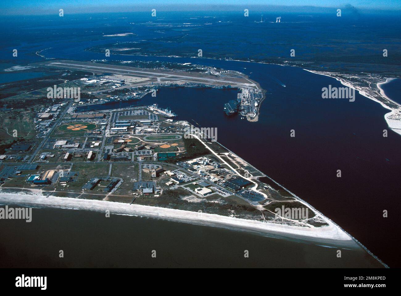 A view looking west showing various warships in port including the ...