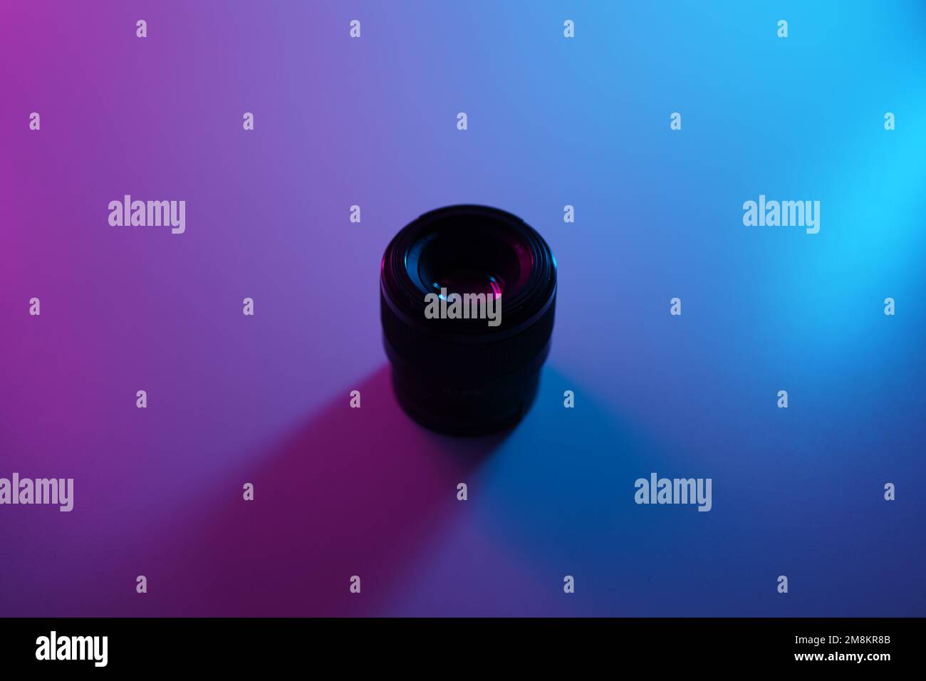 A closeup top view shot of a sony 50mm full frame lens with a cyberpunk ...