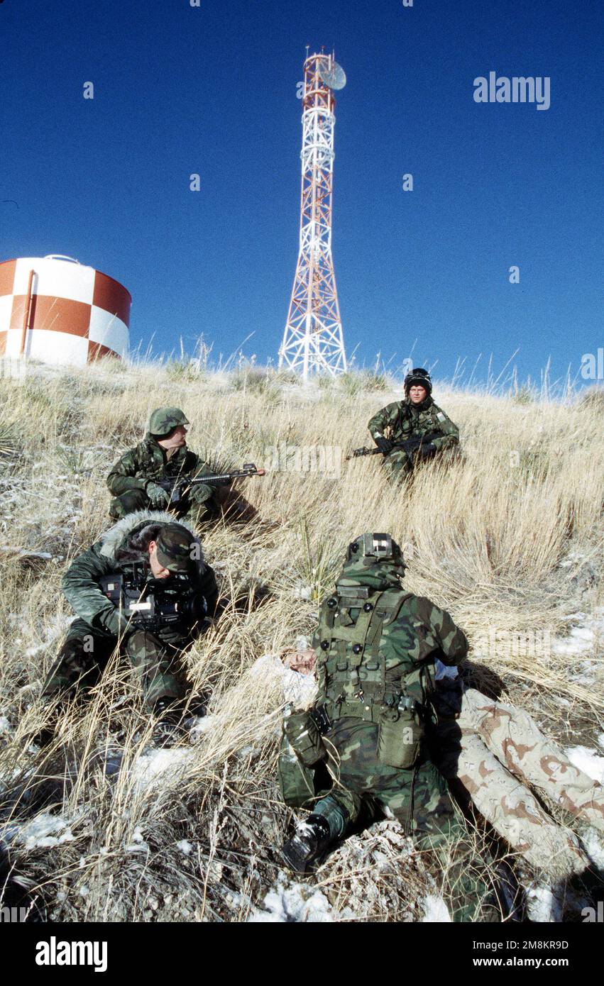 Camp security personnel restrain one of the Inspector General's ...