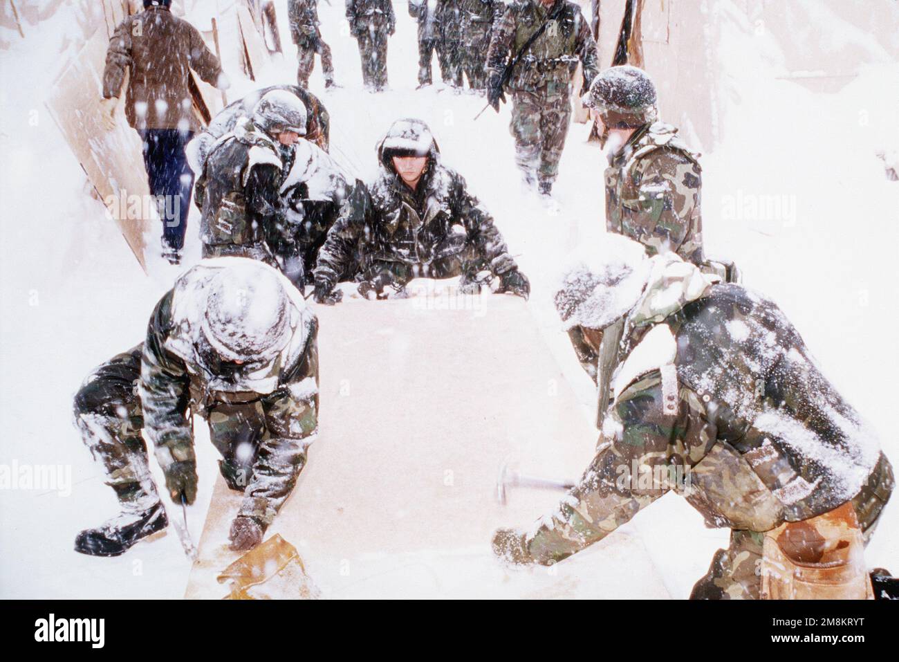 From dawn to dusk, regardless of the weather, Navy Seabees of Naval ...