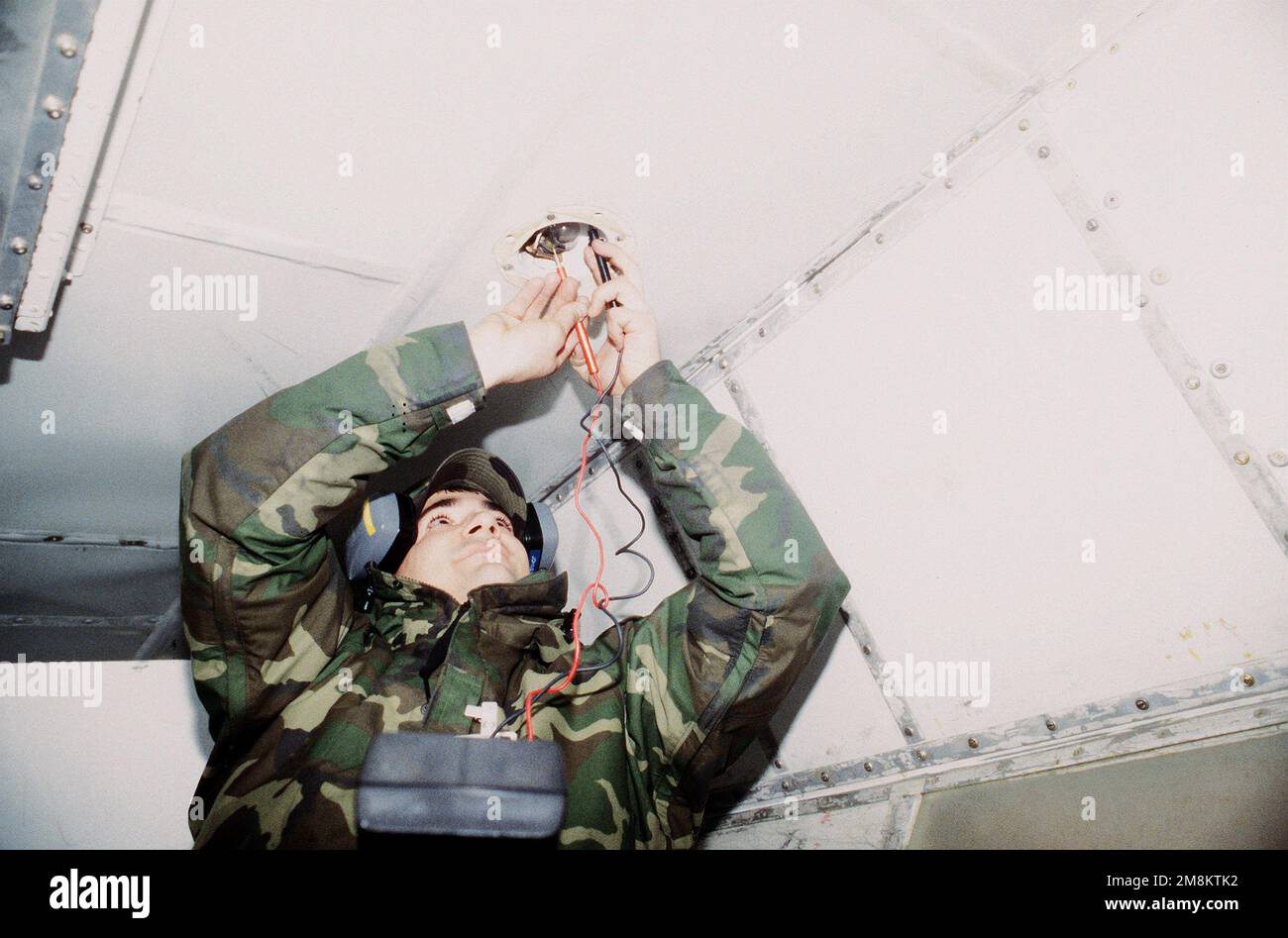 SENIOR AIRMAN Johnson of the 375th Maintenance Squadron checks the ...