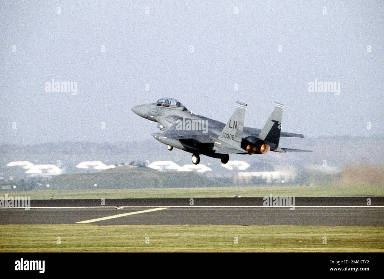 An F-15E Eagle leaves the ground during a NATO Tactical Evaluation ...