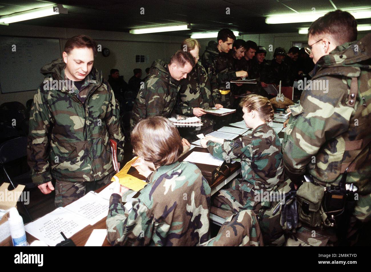 Members of the 48th Fighter Wing process through a mobility line during ...