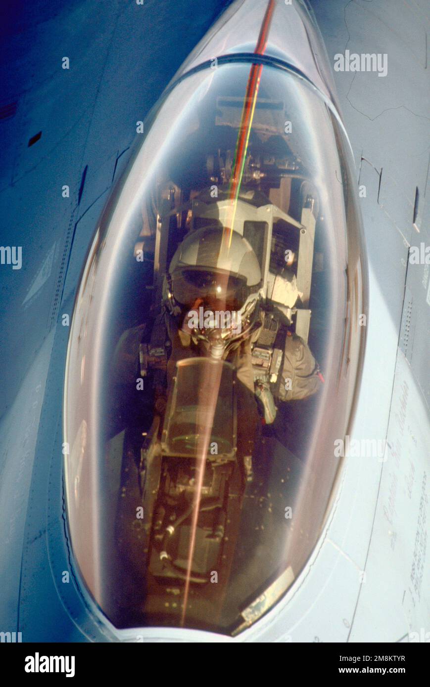 An F-16 pilot, supporting NATO operations Decisive Edge and Joint ...