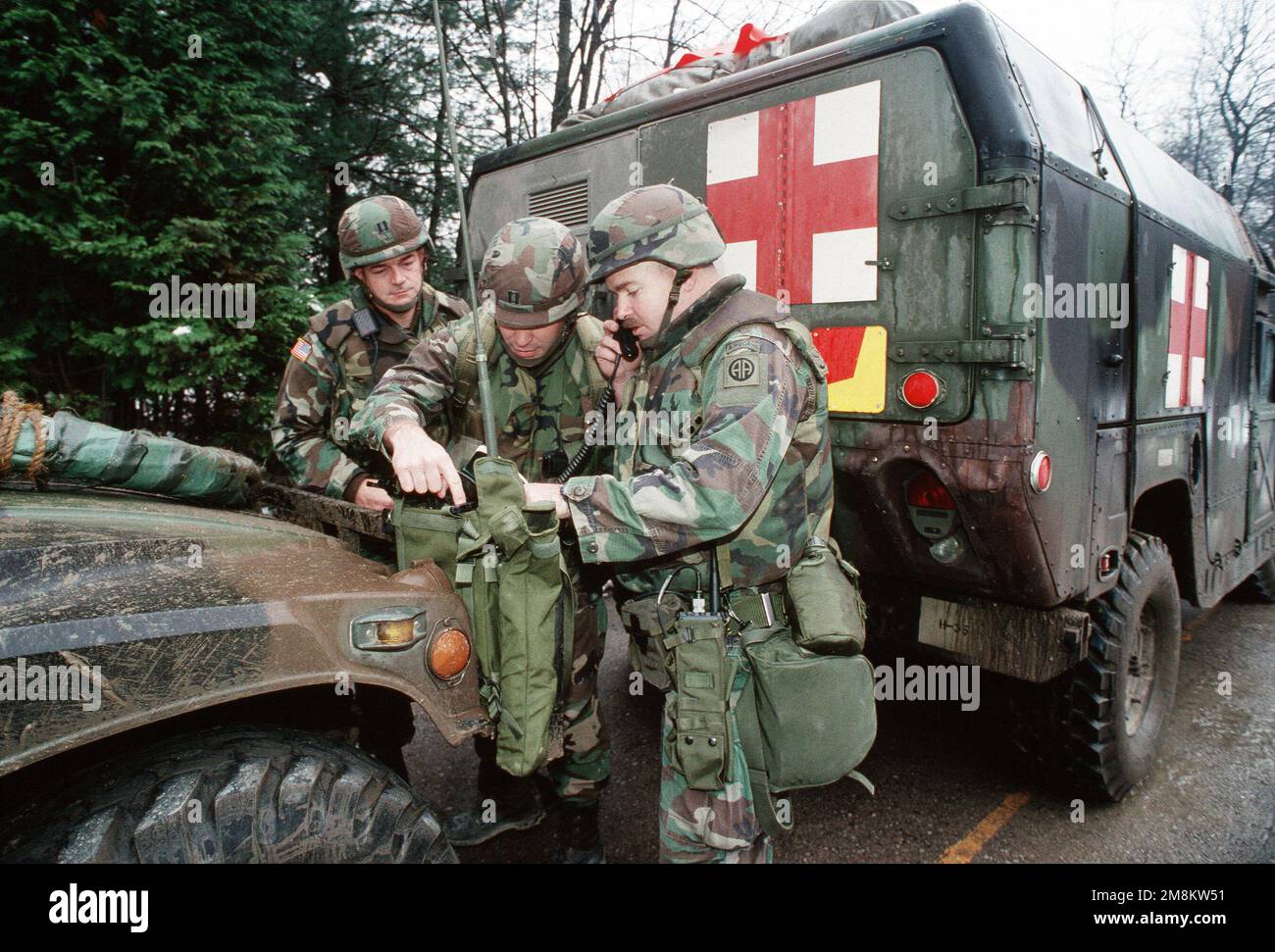 US Air Force Captain Elmo Robison (left), US Army Captain Kyle Campbell ...