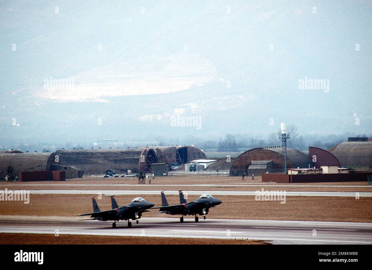 Two F-15E Eagles are ready for take-off from the runway at Aviano Air ...