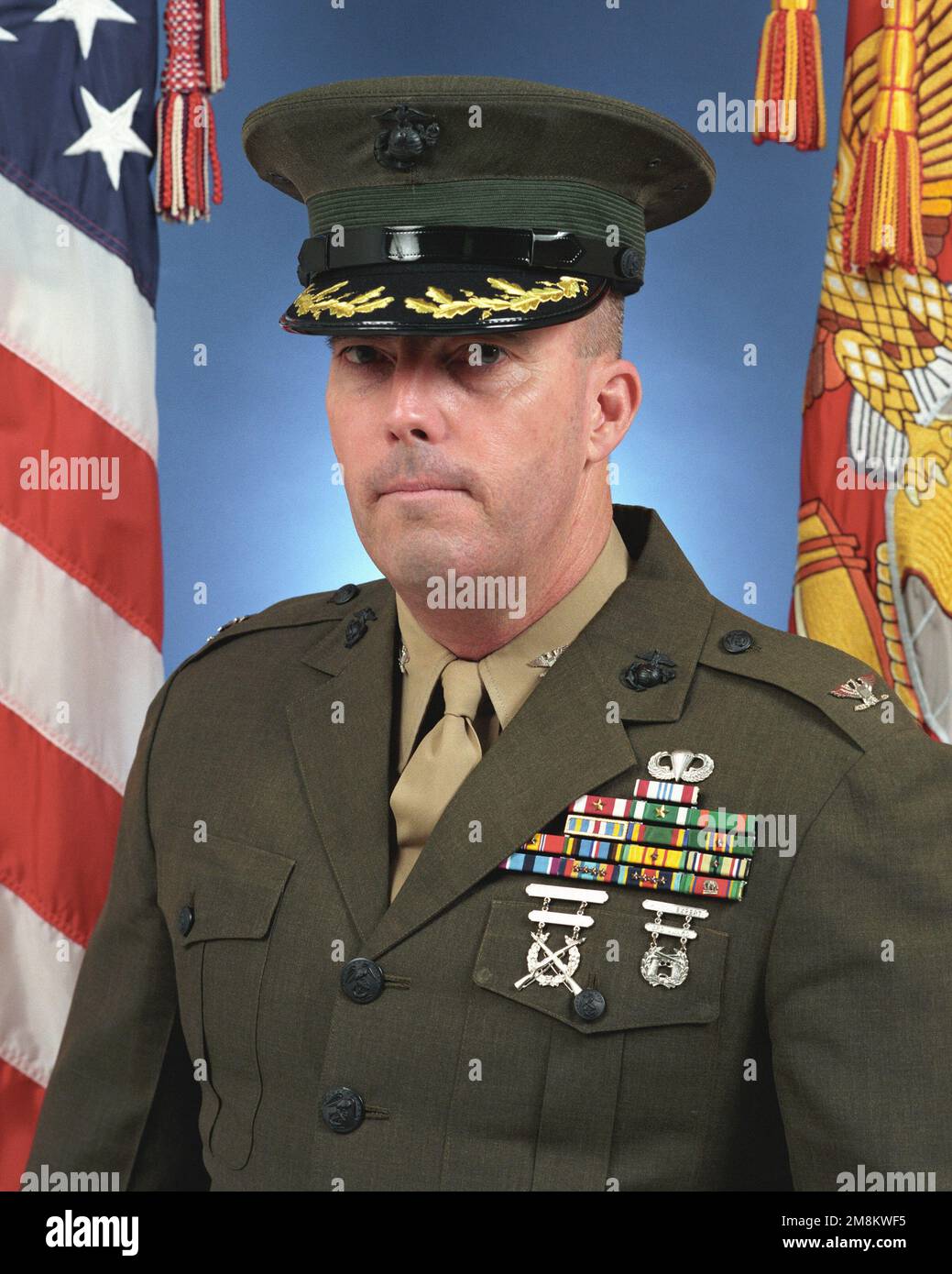 The official officer portrait of Colonel Duggan, US Marine Corps (covered). Base: Marine Corps ...